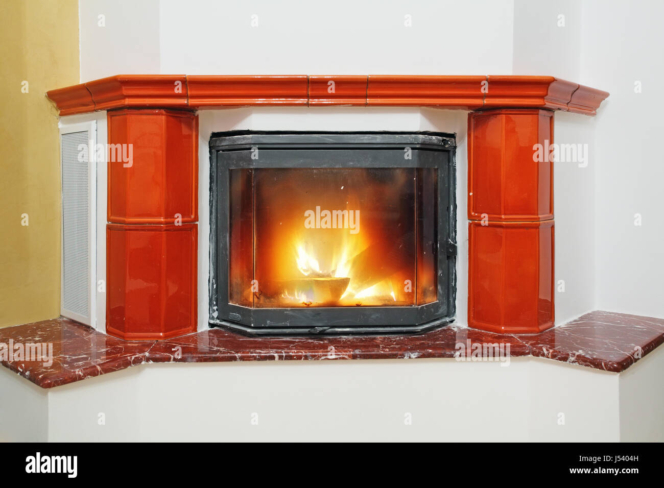 Fireplace in house interior Stock Photo - Alamy