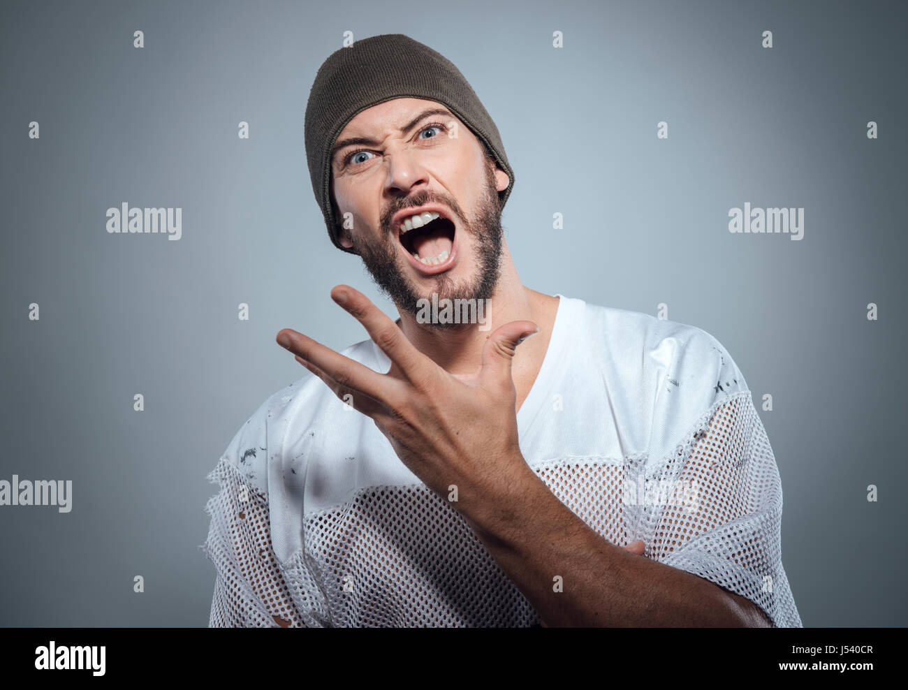 Aggressive bad boy gesturing with strong attitude Stock Photo - Alamy