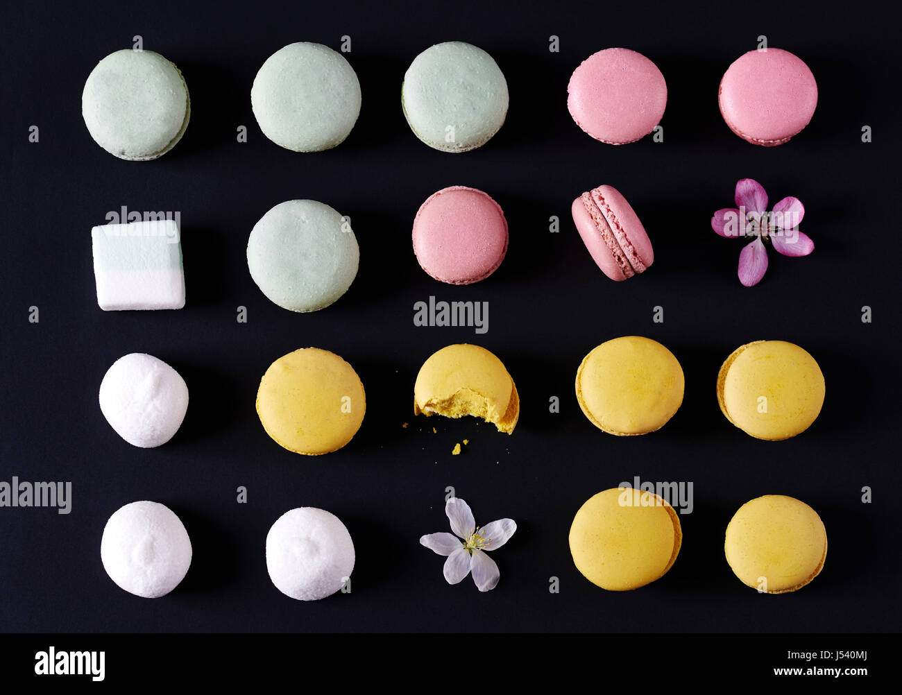 Colorful macaroons marshmallows with flowers Stock Photo - Alamy