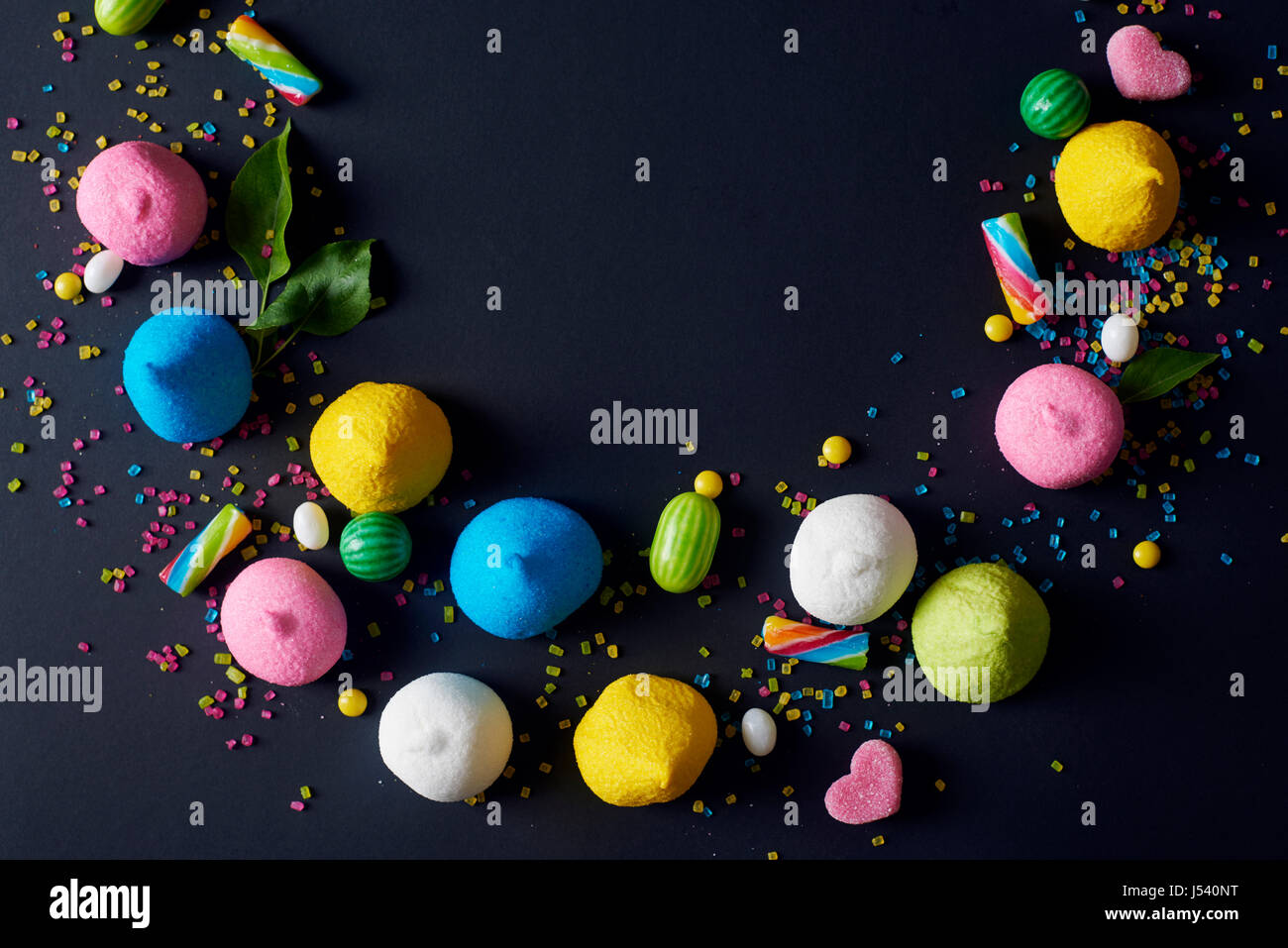 Creation of colorful candies and sweets Stock Photo - Alamy