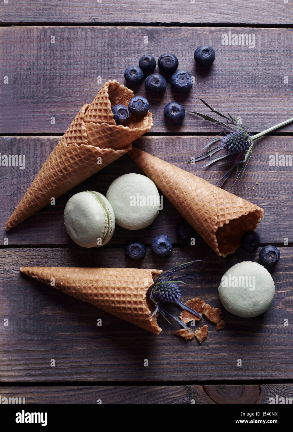 Stylish sweet food concept on wooden table Stock Photo - Alamy
