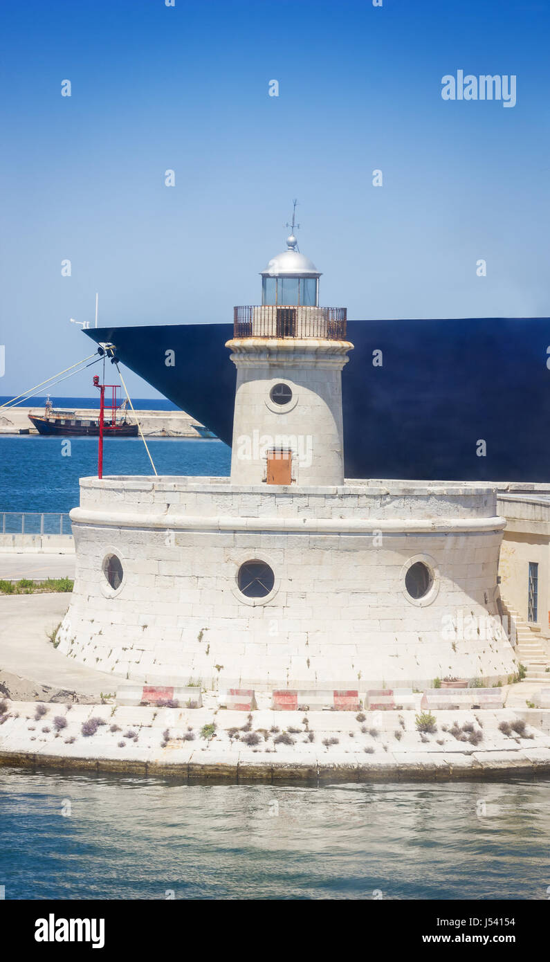 ancient watchtower in front of the ship's hull Stock Photo - Alamy