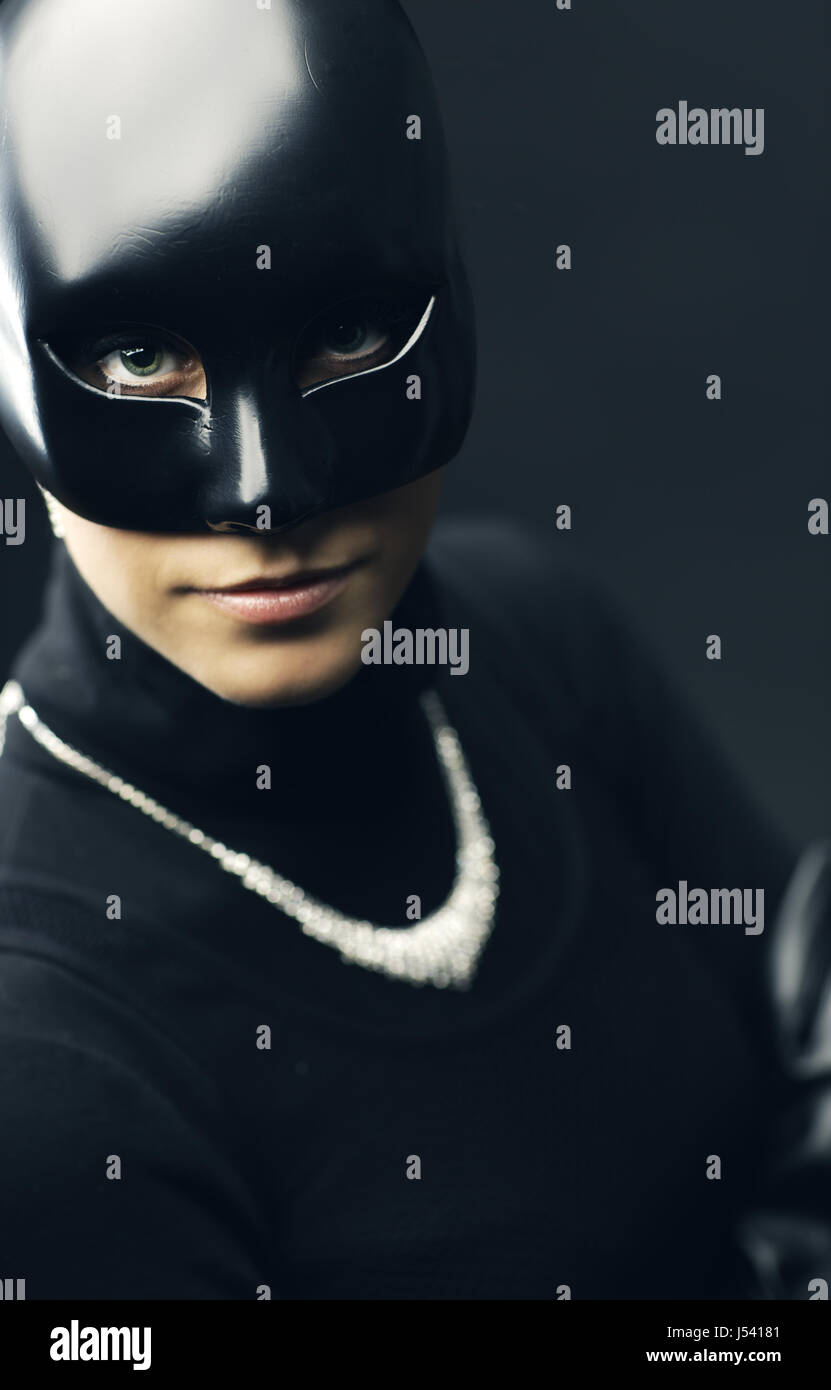 Female thief in black mask hi-res stock photography and images - Alamy