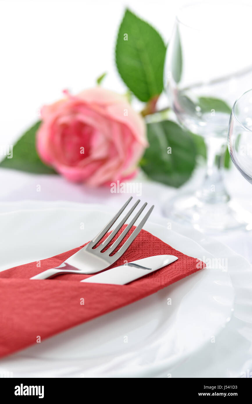 Elegant restaurant table setting for a romantic dinner with rose plates ...