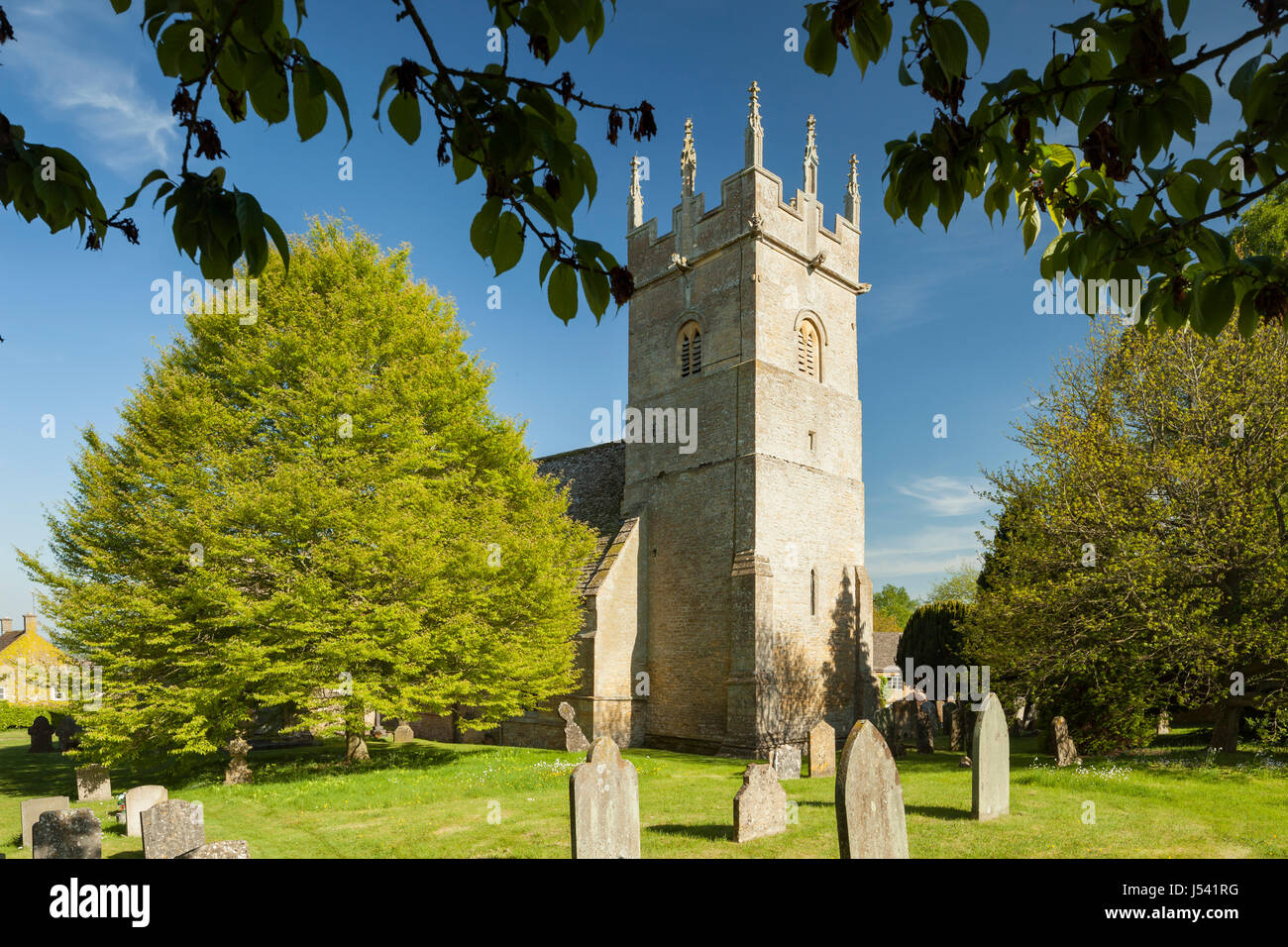 Spring afternoon at St James church in the Cotswolds village of ...