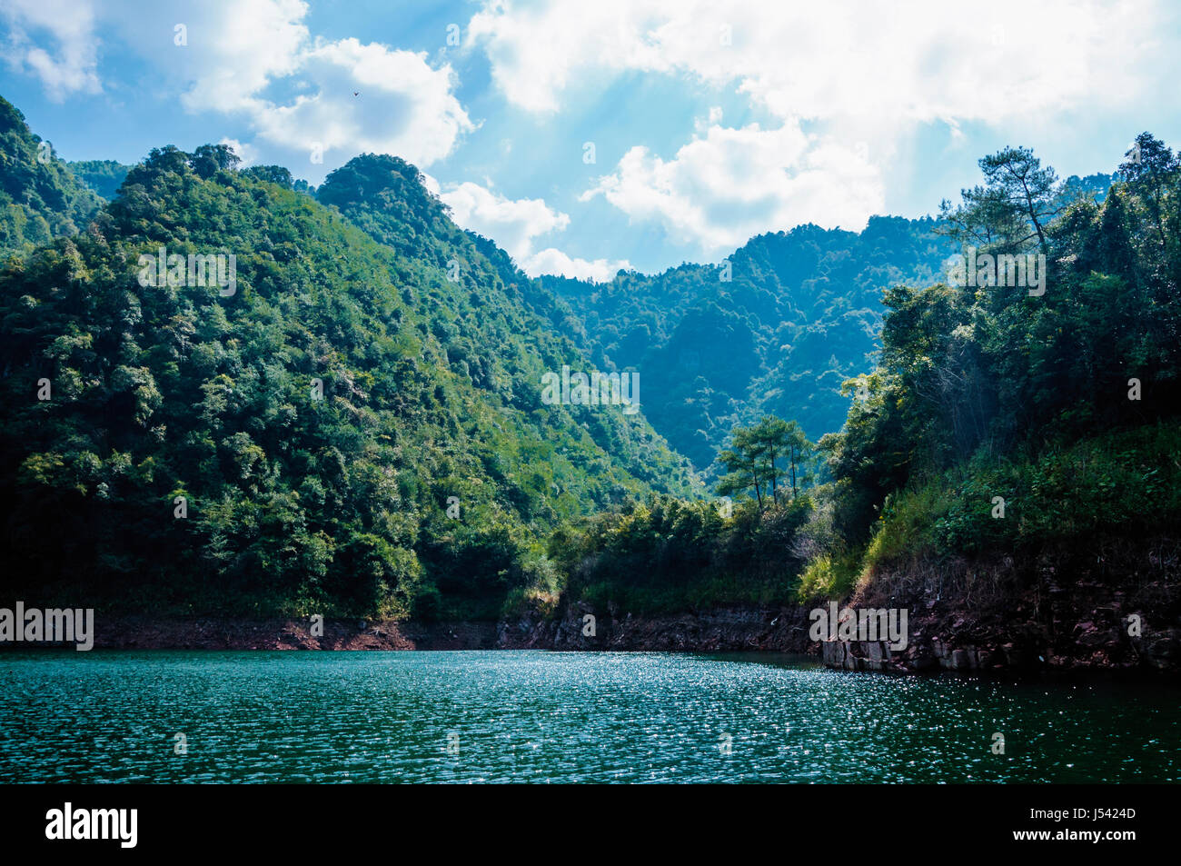 Beautiful reservoir scenery with blue sky in summer Stock Photo - Alamy