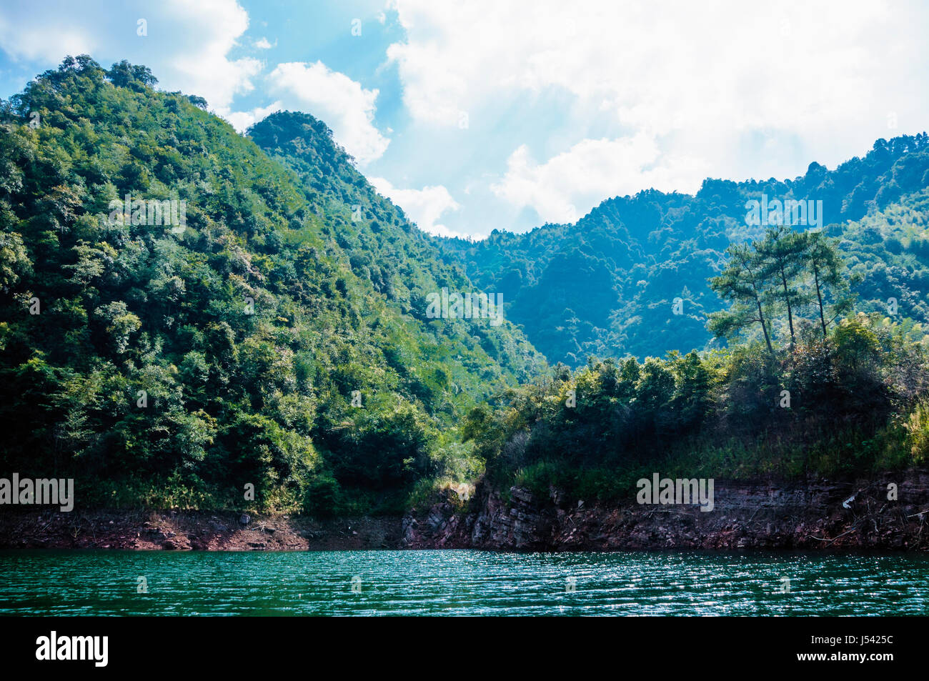 Beautiful reservoir scenery with blue sky in summer Stock Photo - Alamy