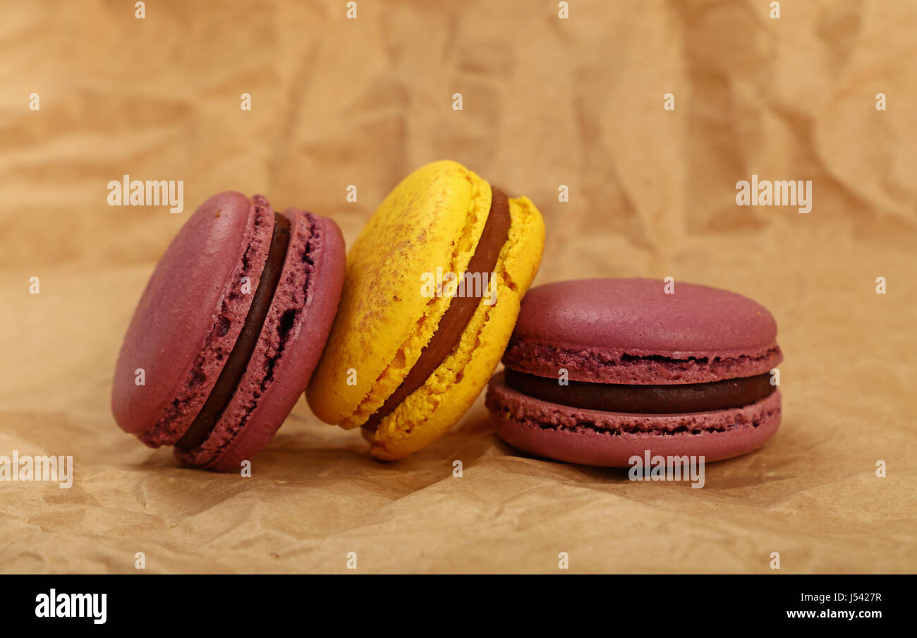 Group of several fresh colorful traditional French macaroon pastry ...