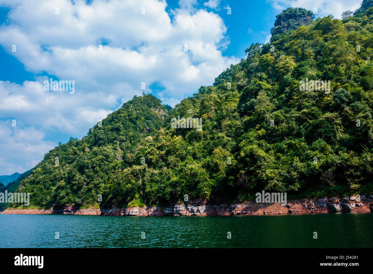 Beautiful reservoir scenery with blue sky in summer Stock Photo - Alamy