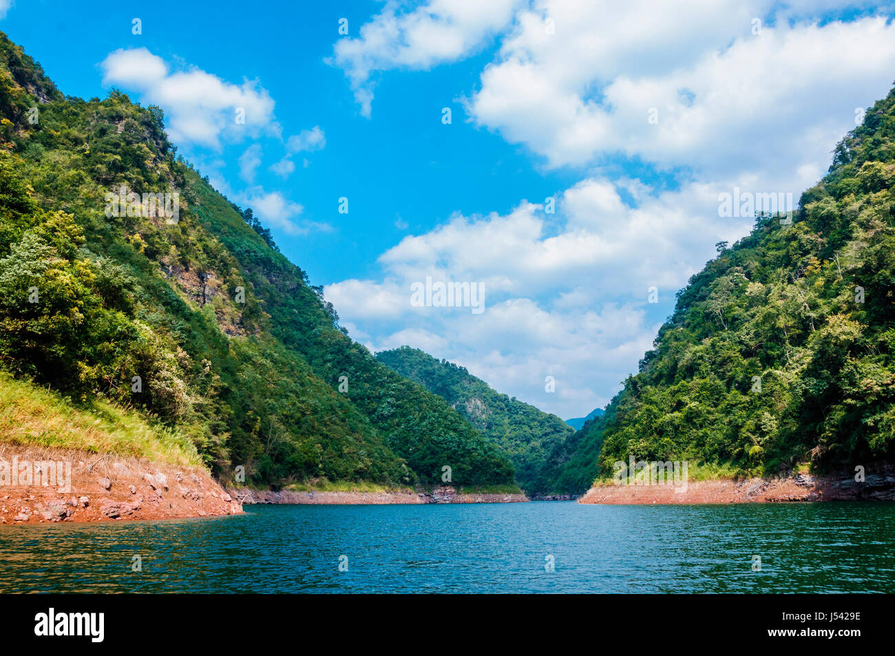 Beautiful reservoir scenery with blue sky in summer Stock Photo - Alamy