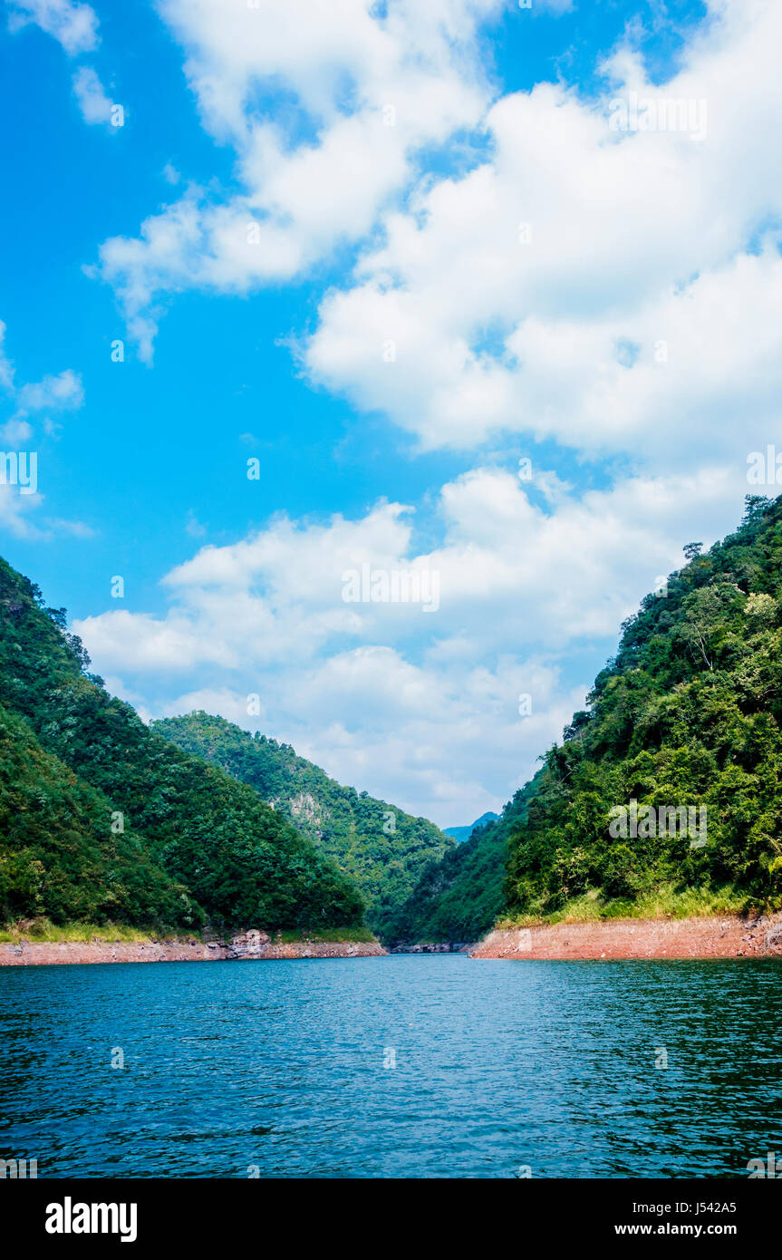 Beautiful reservoir scenery with blue sky in summer Stock Photo - Alamy