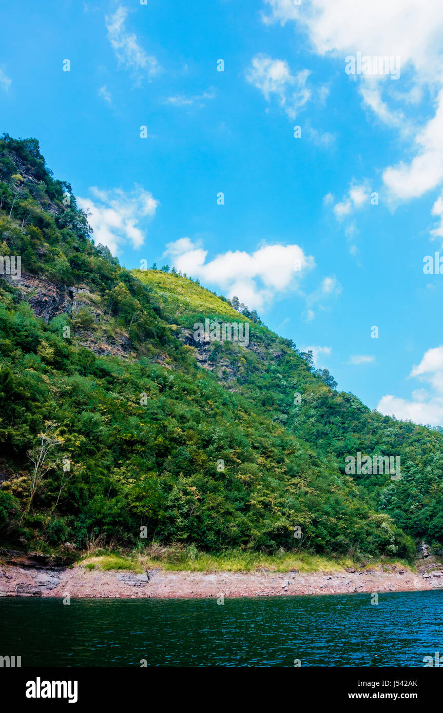 Beautiful reservoir scenery with blue sky in summer Stock Photo - Alamy