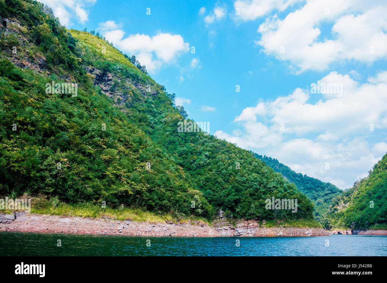 Beautiful reservoir scenery with blue sky in summer Stock Photo - Alamy