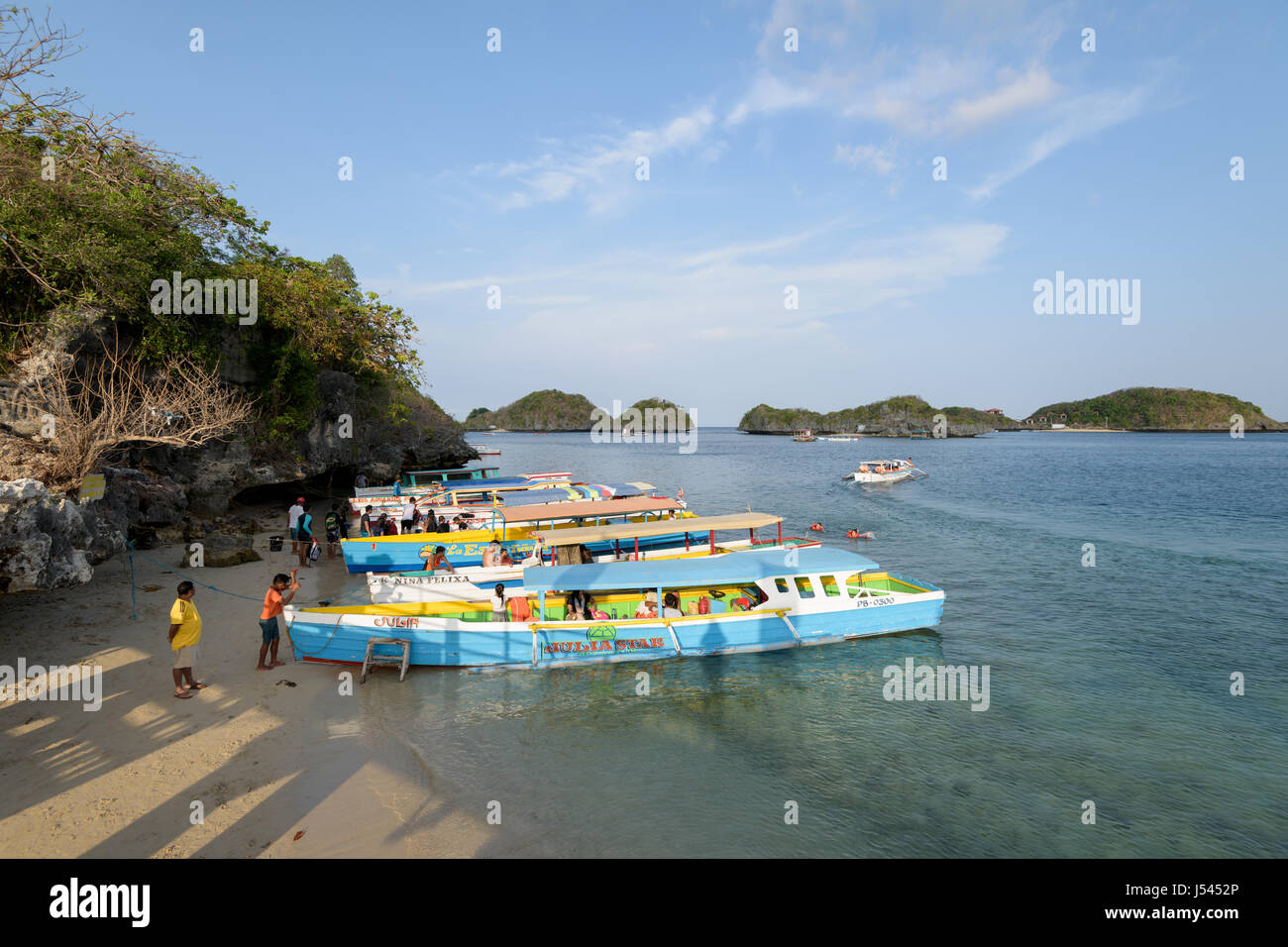 Quezon Island, Philippines - April 11, 2017: Tourist boats waiting for ...