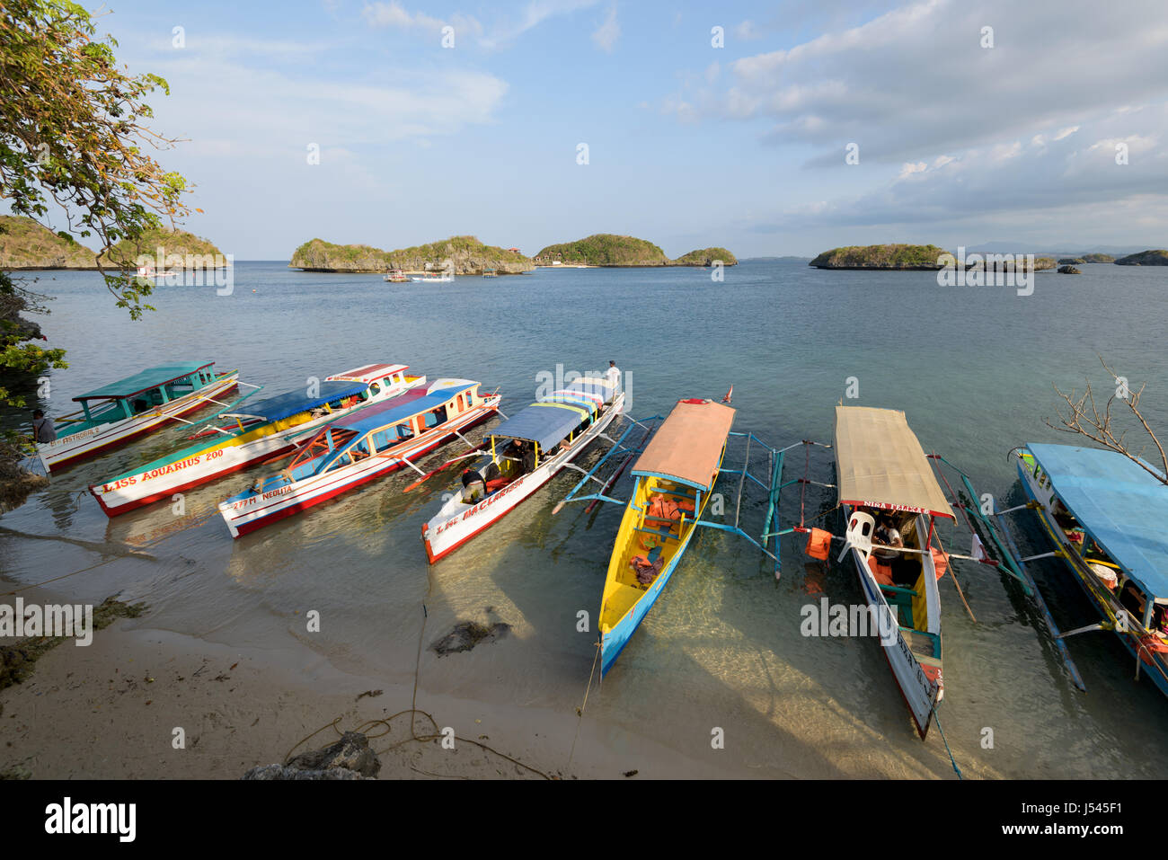 Quezon Island, Philippines - April 11, 2017: Tourist boats waiting for ...