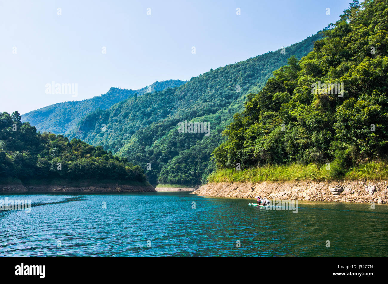 Beautiful reservoir scenery with blue sky in summer Stock Photo - Alamy