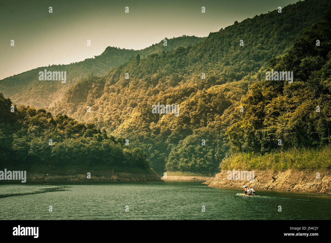 Beautiful reservoir scenery with blue sky in summer Stock Photo - Alamy