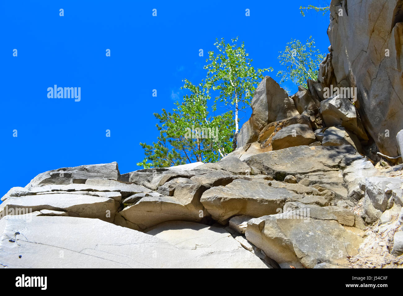 Rocks trees sky hi-res stock photography and images - Alamy
