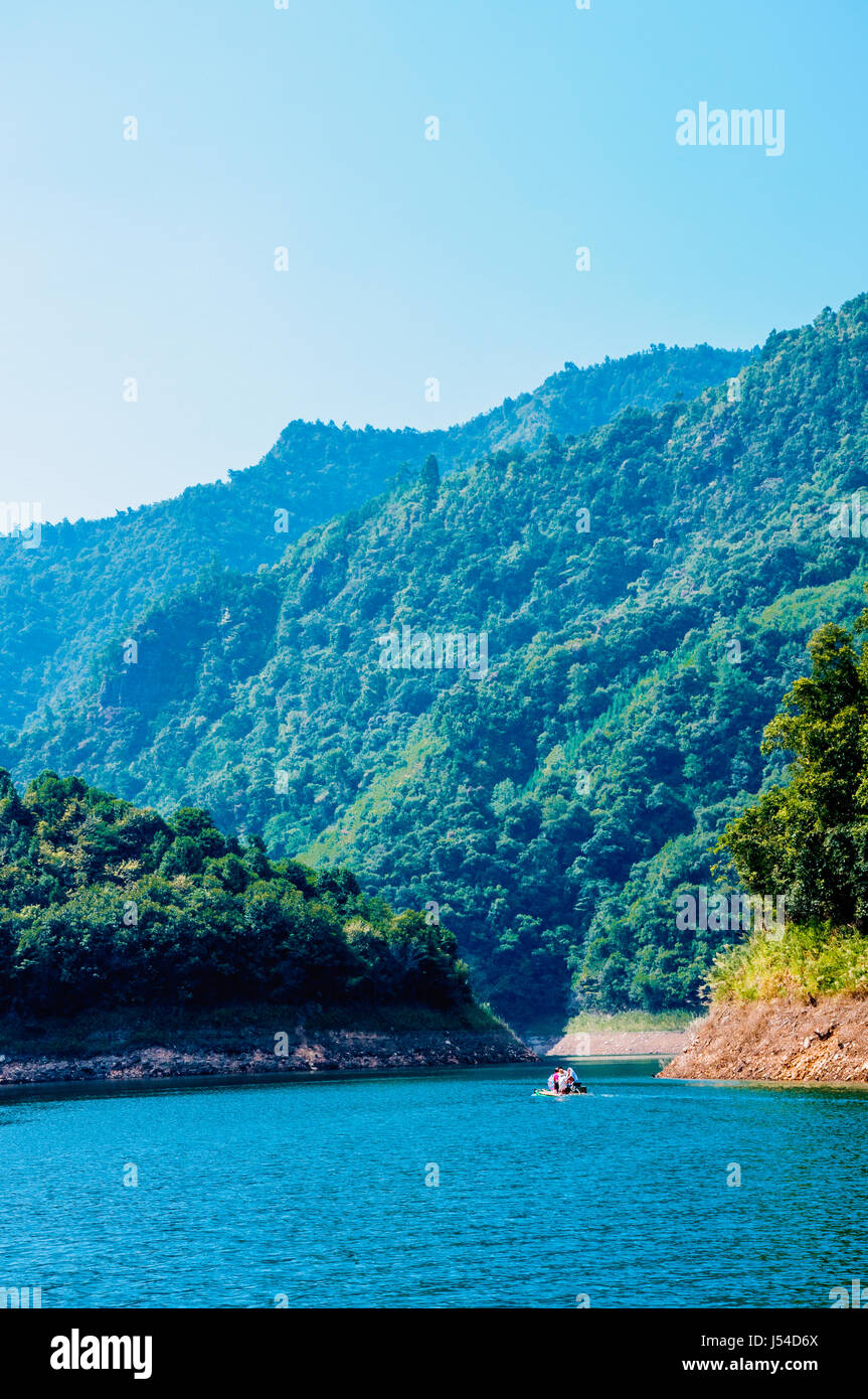 Beautiful reservoir scenery with blue sky in summer Stock Photo - Alamy