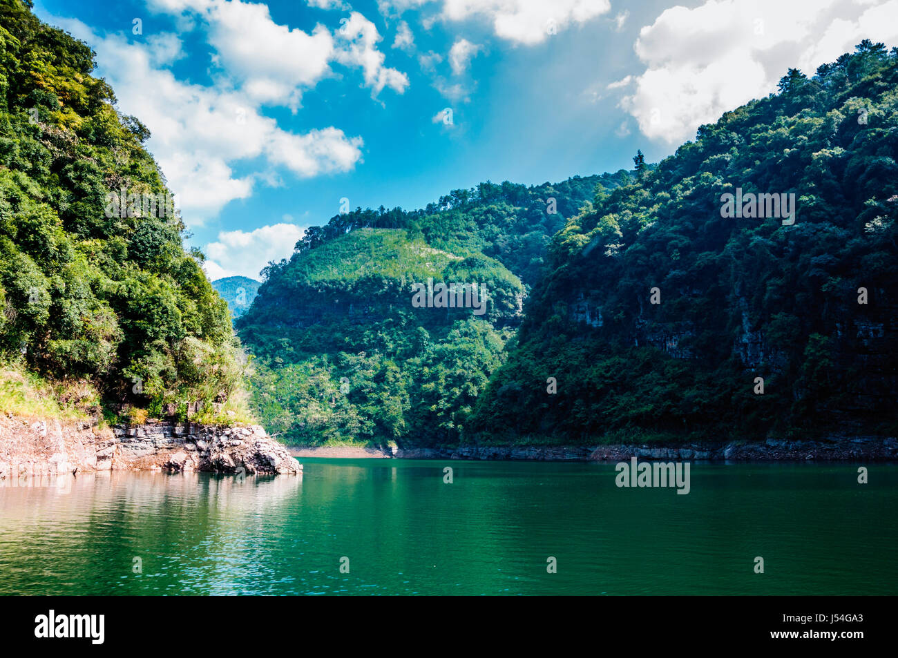 Beautiful reservoir scenery with blue sky in summer Stock Photo - Alamy