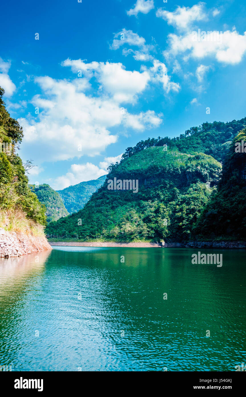 Beautiful reservoir scenery with blue sky in summer Stock Photo - Alamy