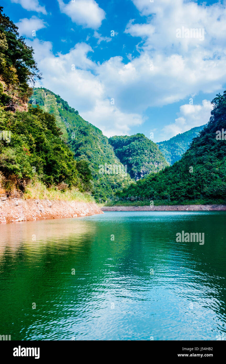 Beautiful reservoir scenery with blue sky in summer Stock Photo - Alamy