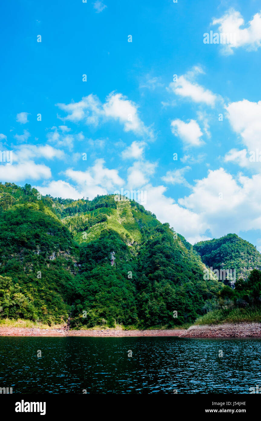 Beautiful reservoir scenery with blue sky in summer Stock Photo - Alamy