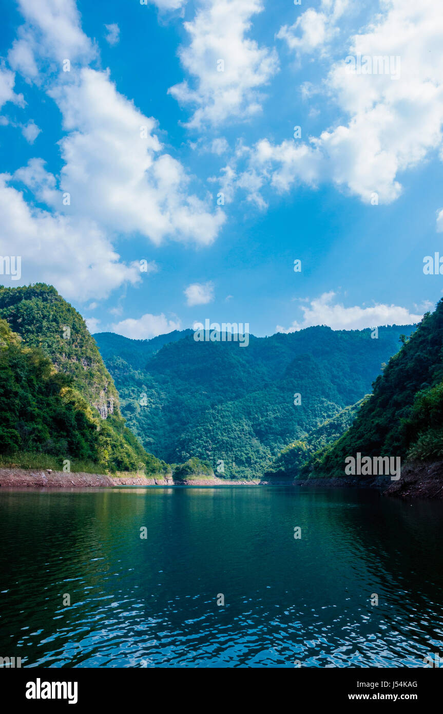 Beautiful reservoir scenery with blue sky in summer Stock Photo - Alamy