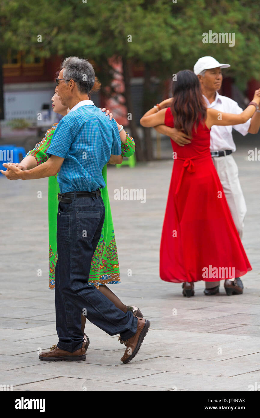 Chinese people dancing in park hi-res stock photography and images - Alamy