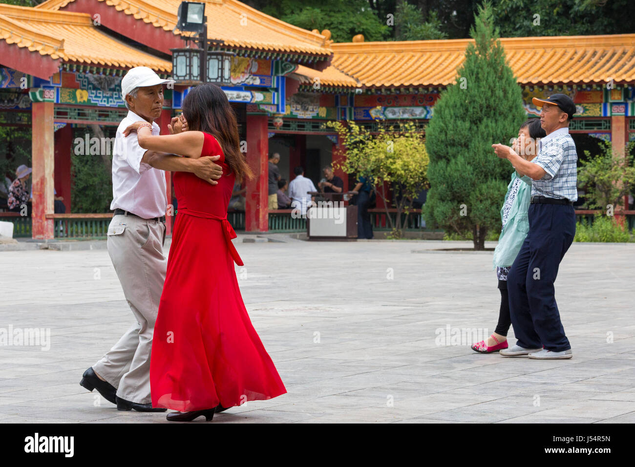 Chinese people dancing in park hi-res stock photography and images - Alamy