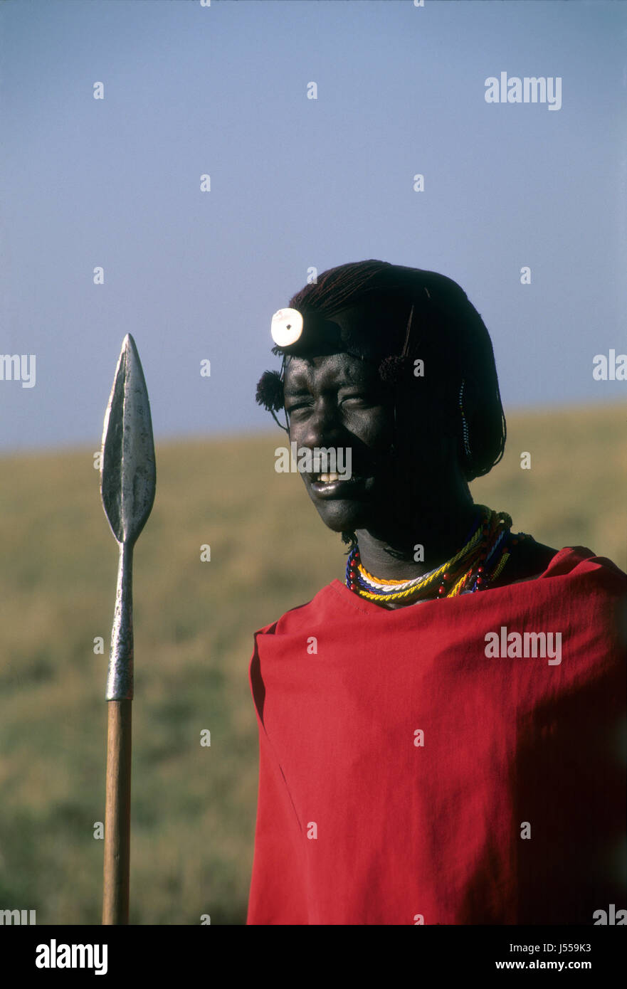 Masai Warrior With Spear On The African Plains Near Talek River Masai