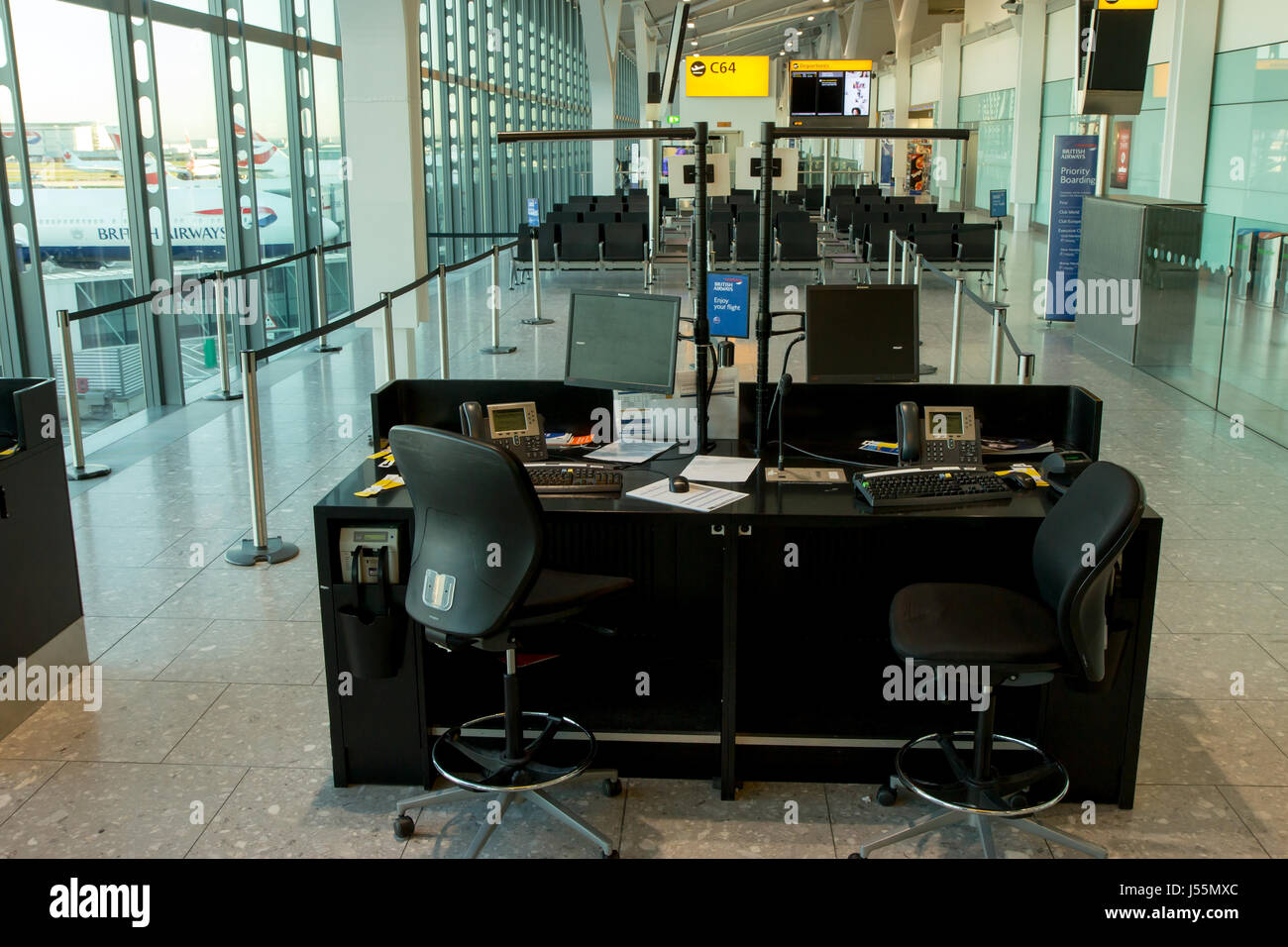Empty departure lounge at airport terminal, London Heathrow. Checkpoint ...