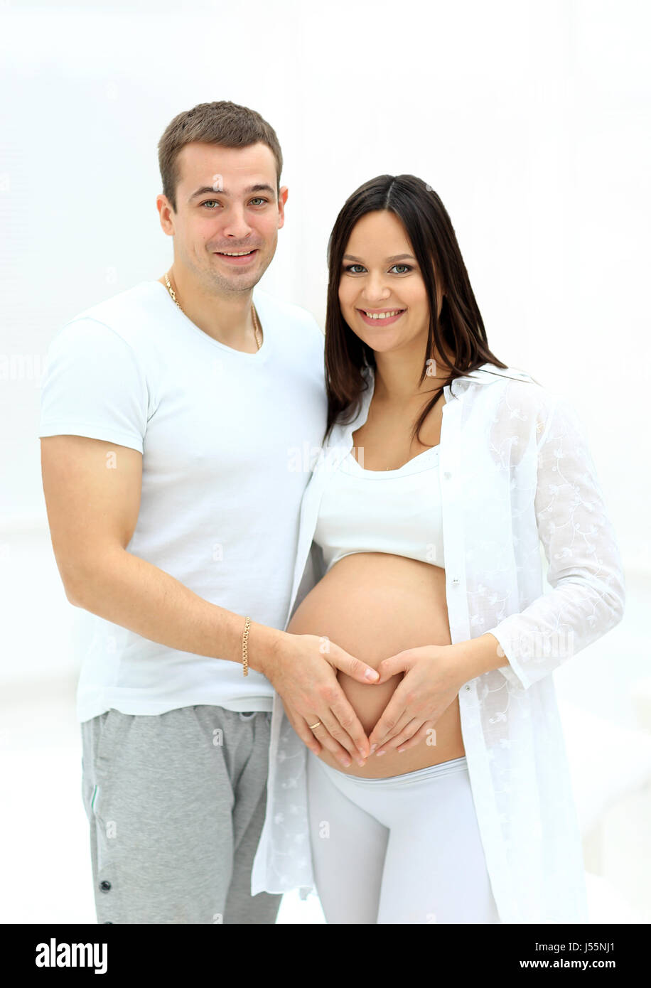 Delighted young parents expecting a little baby Stock Photo - Alamy
