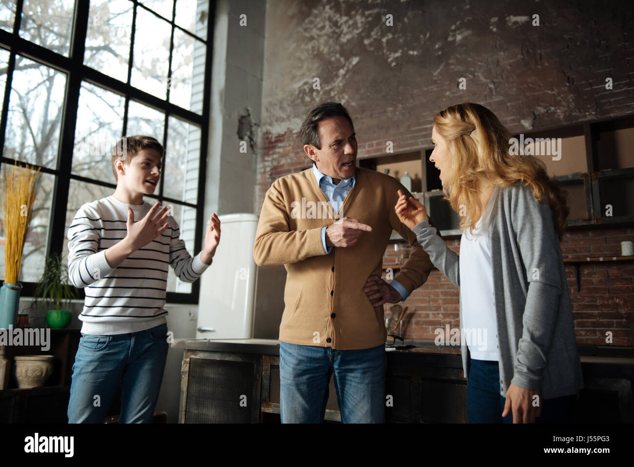 Angry parents sorting out theirs relationship Stock Photo - Alamy
