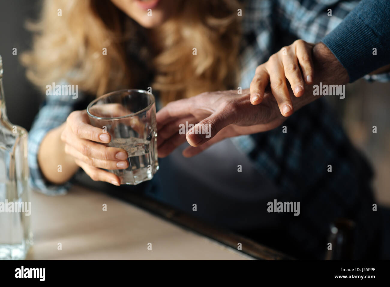 Picture of glass being full of alcohol Stock Photo - Alamy