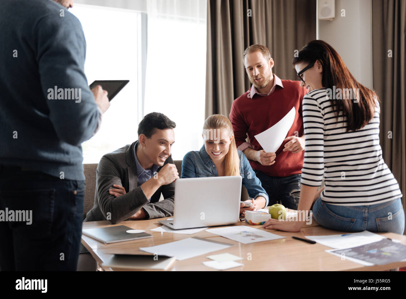 Collective of professionals discussing important questions Stock Photo ...