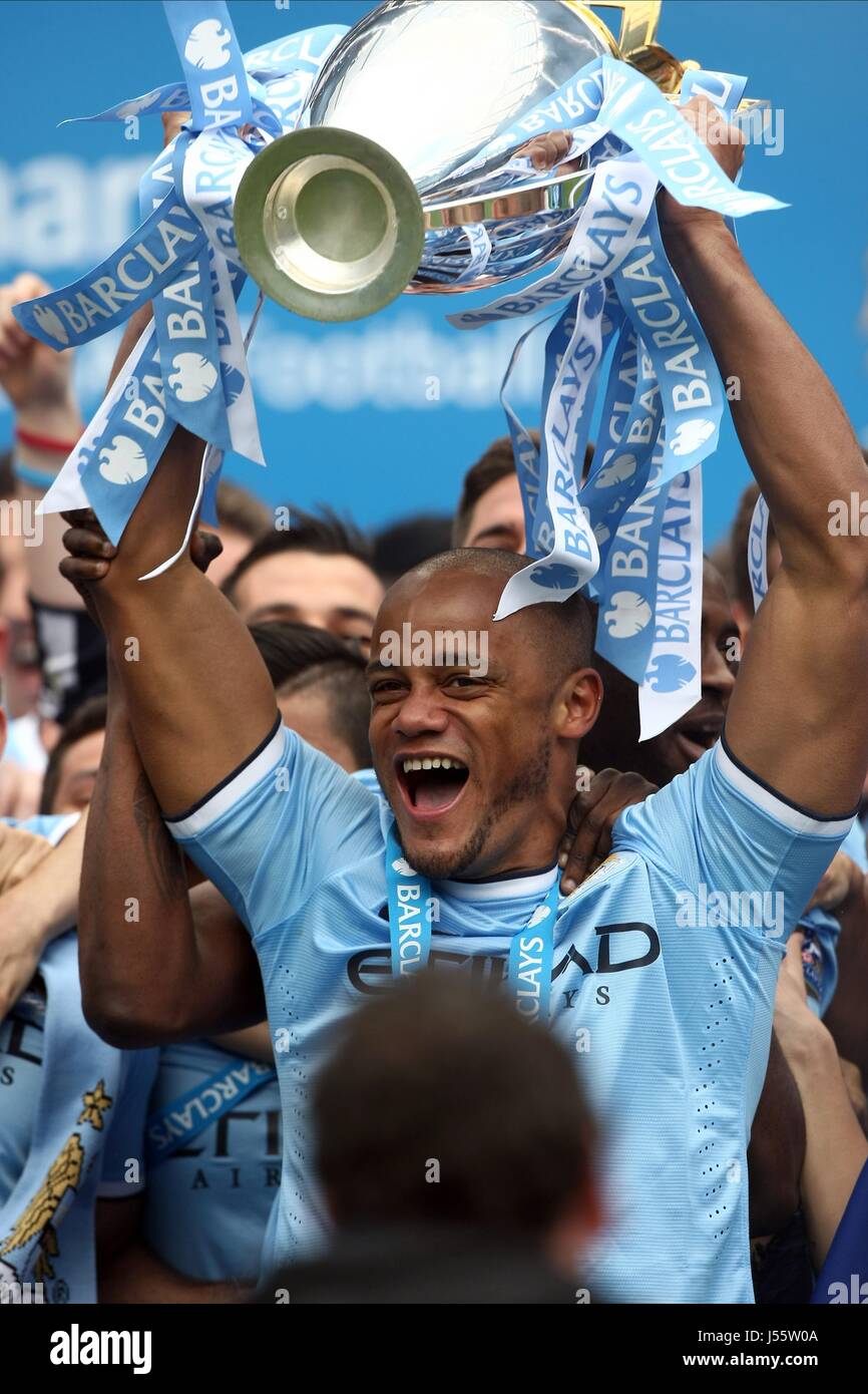 VINCENT KOMPANY LIFTS TROPHY MANCHESTER CITY FC MANCHESTER CITY FC ...