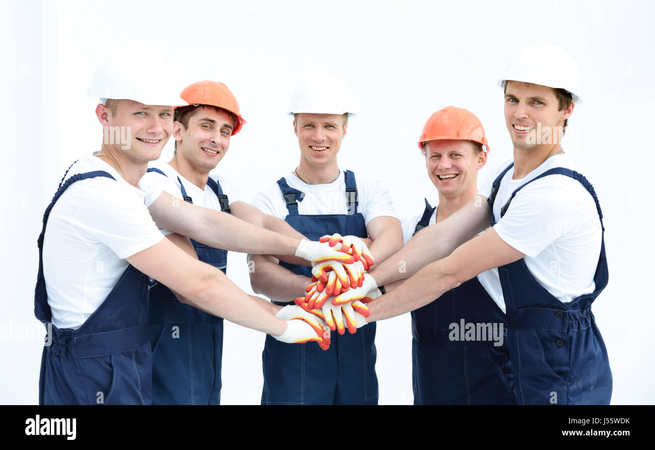 Team teamwork builders constructors hi-res stock photography and images ...