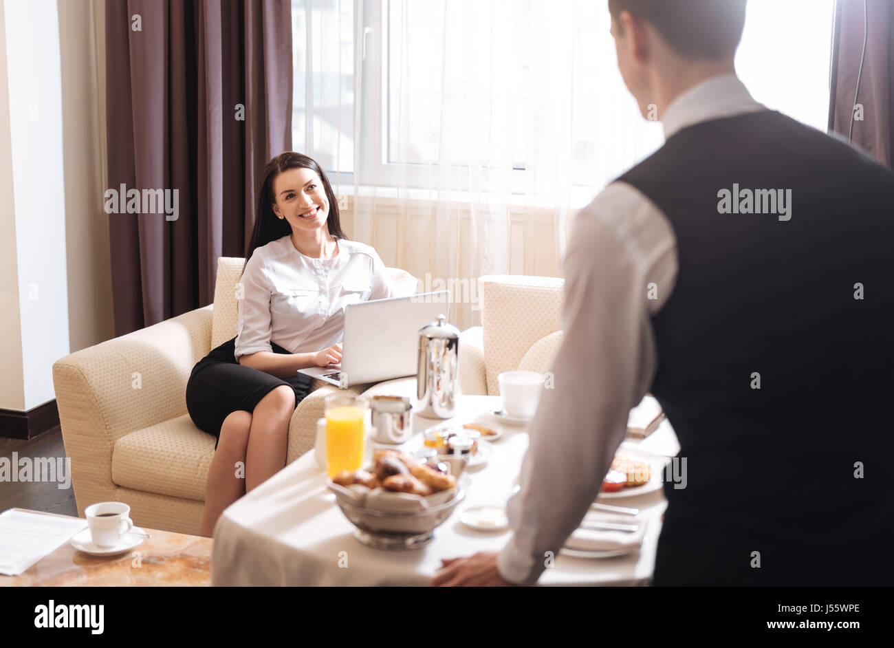Hotel waiter breakfast hi-res stock photography and images - Alamy