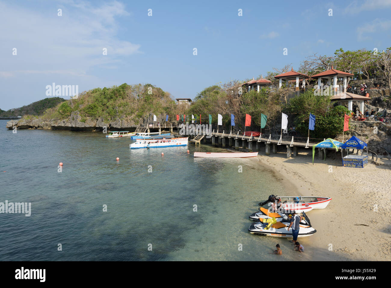 Quezon Island, Philippines - April 11, 2017: Jet Ski pulling a banana ...