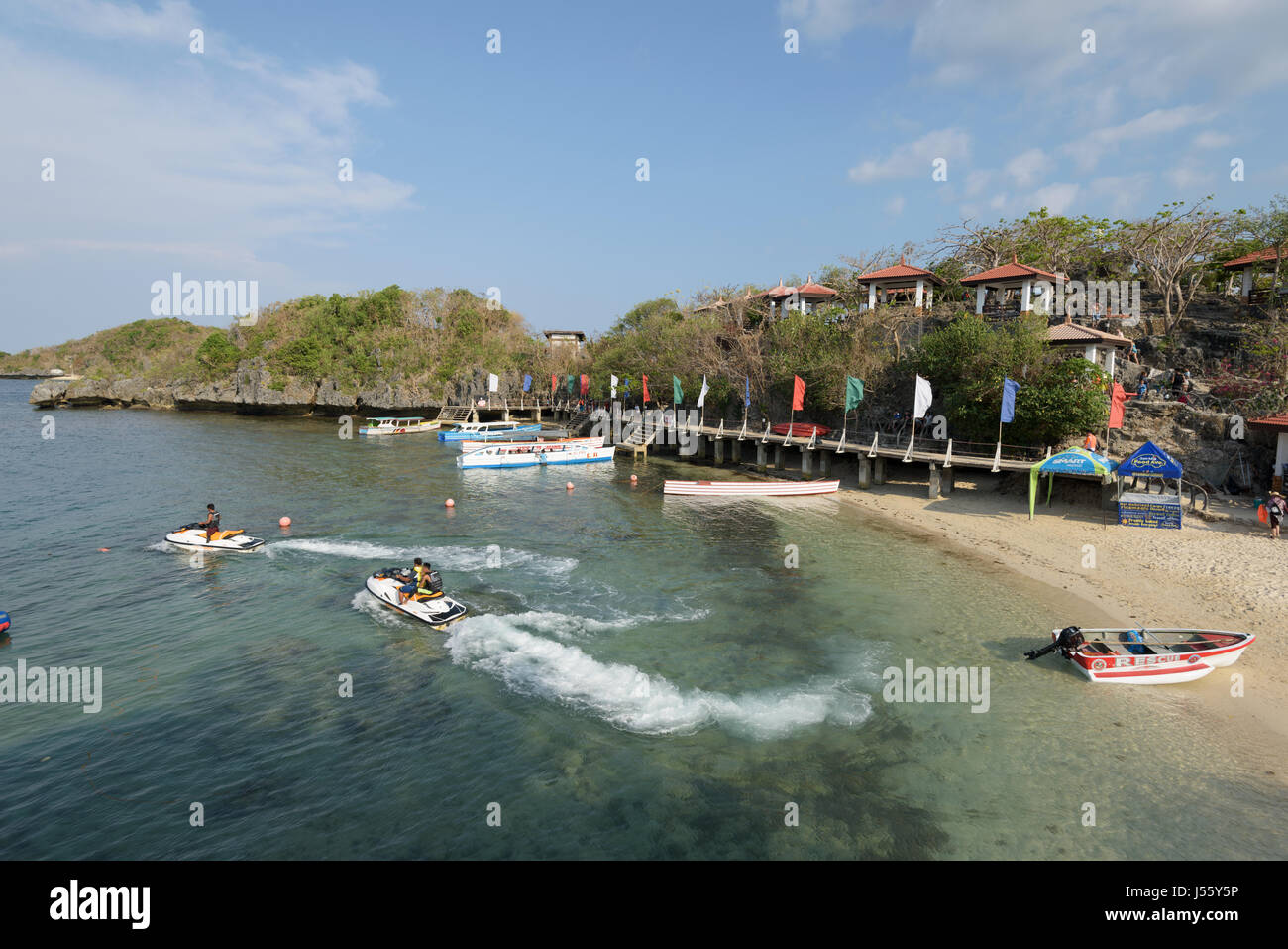 Quezon Island, Philippines - April 11, 2017: Jet Ski pulling a banana ...