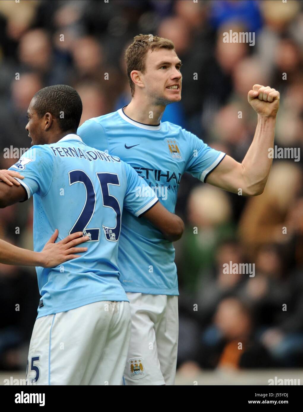 Edin dzeko manchester city celebrates hi-res stock photography and ...