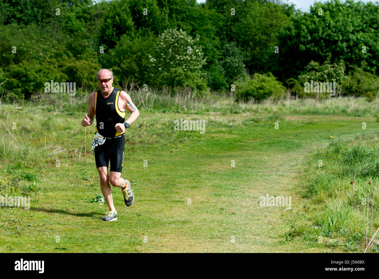 Man running in the Stratford Triathlon, Stratford-upon-Avon, UK Stock ...
