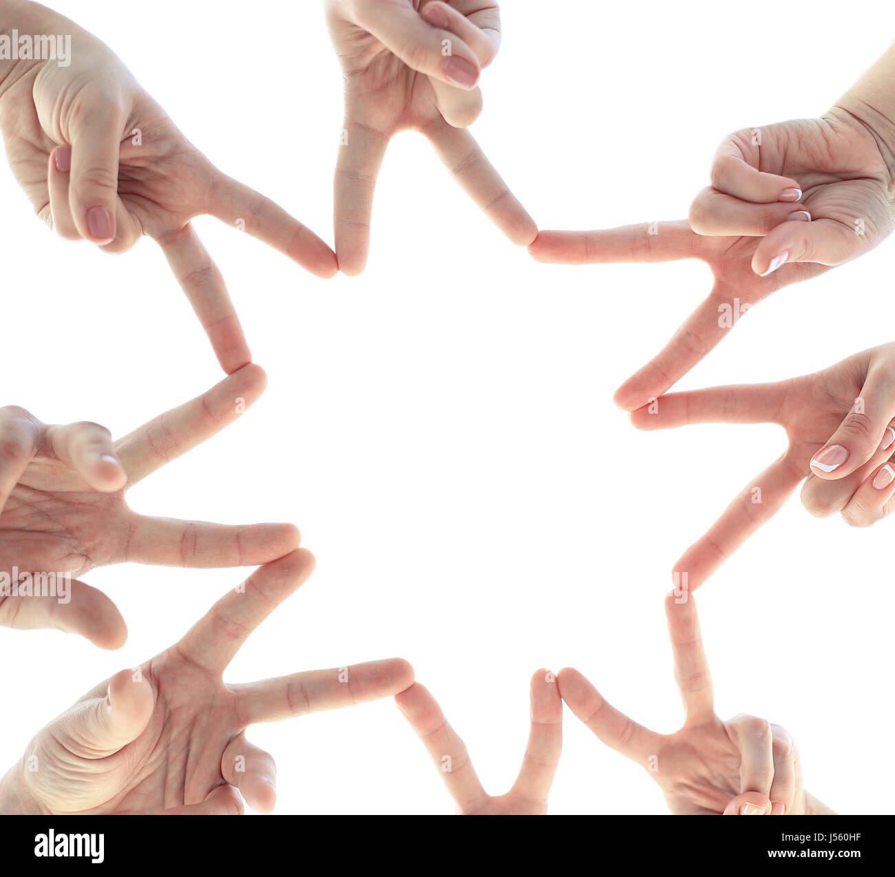 Business people joining hands in a circle in the office Stock Photo - Alamy