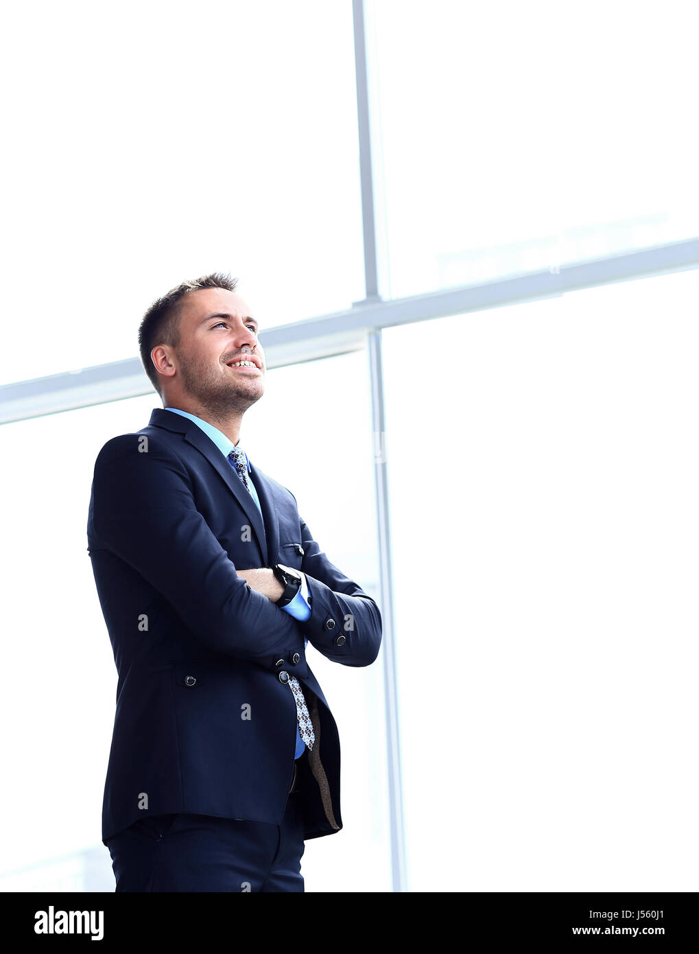 happy joyful businessman looking to the future Stock Photo - Alamy