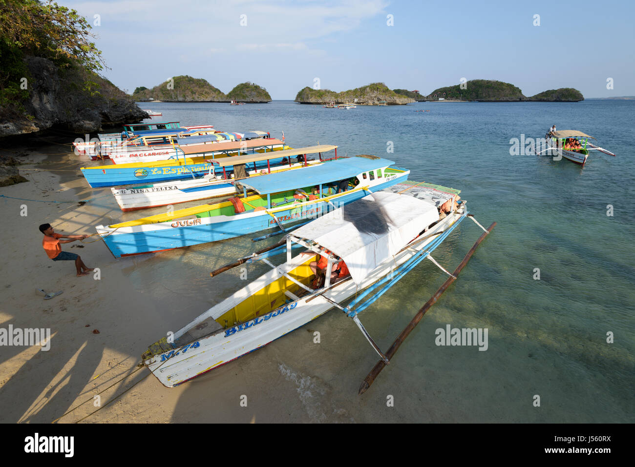 Quezon Island, Philippines - April 11, 2017: Tourist boats waiting for ...