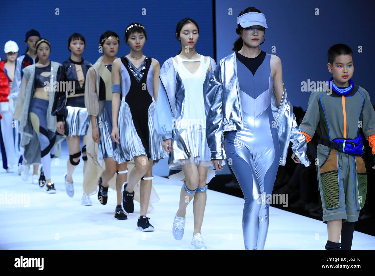 Beijing, China. 16th May, 2017. Models present fashion creations ...