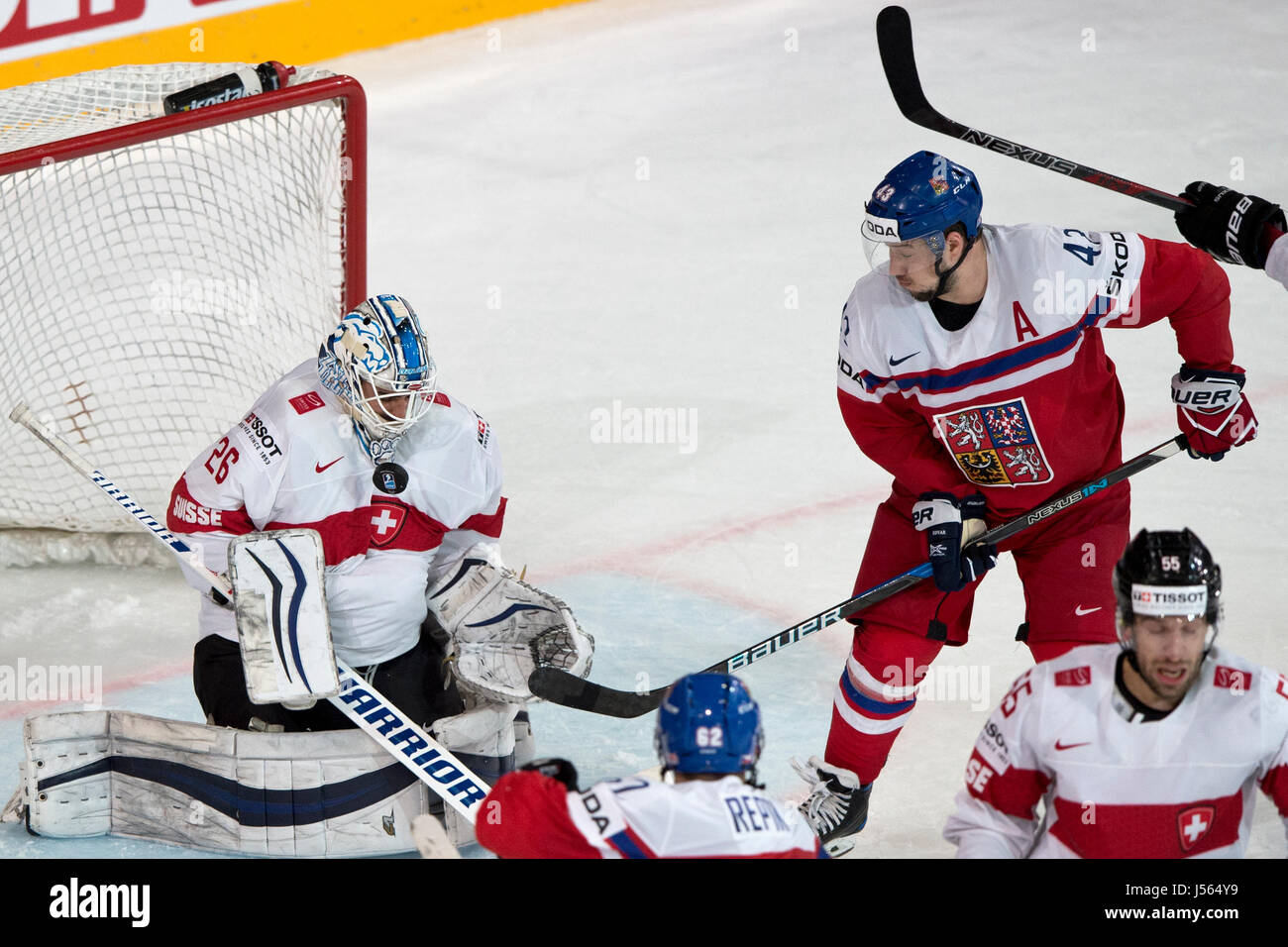 From left: Swiss goalie NIKLAS SCHLEGEL, Czech MICHAL REPIK and JAN ...