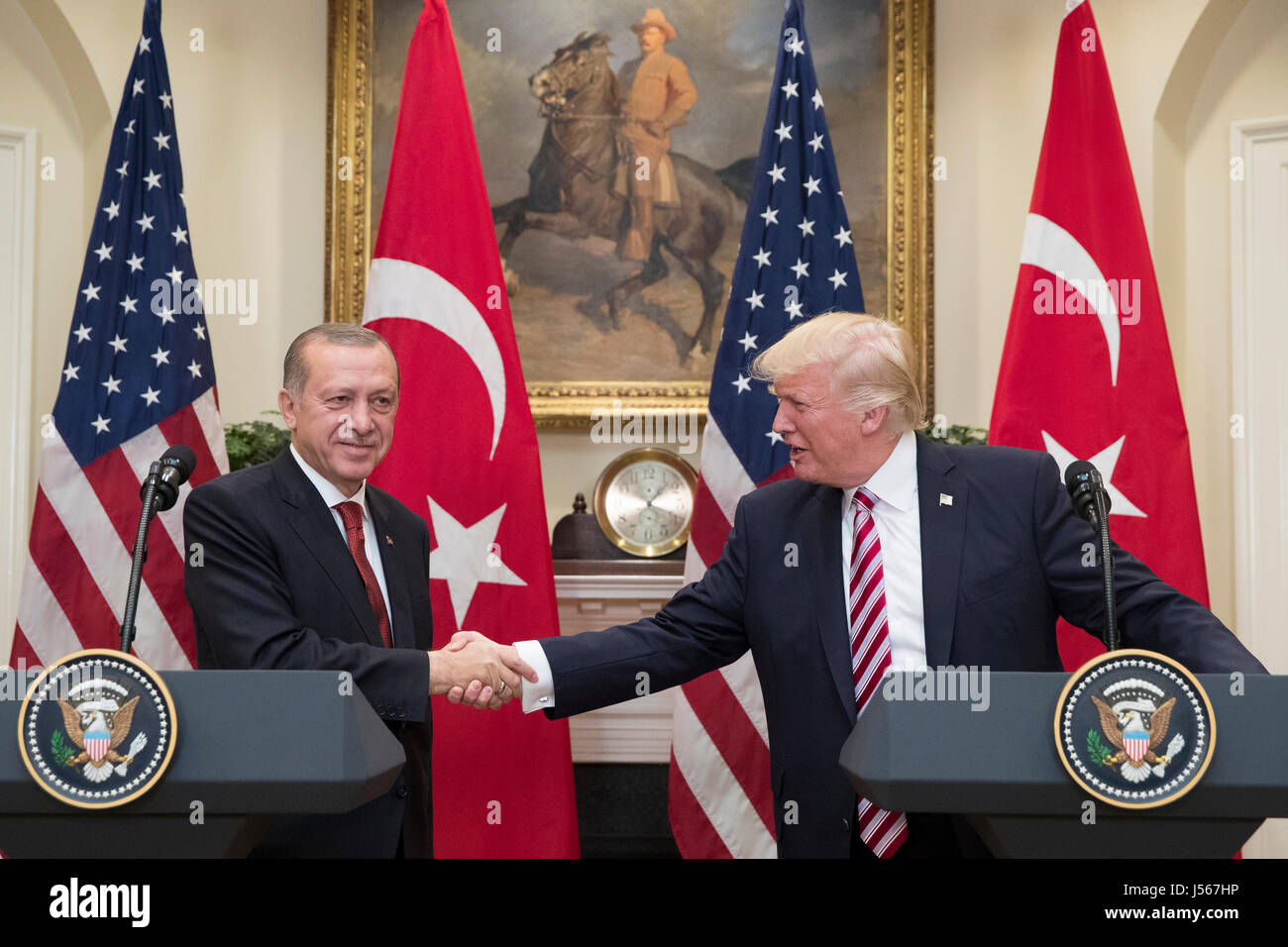 US President Donald J. Trump (R) shakes hands with President of Turkey ...