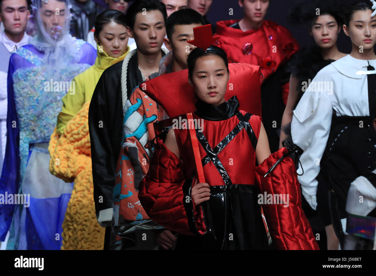 Beijing, China. 17th May, 2017. Models present creations designed by ...